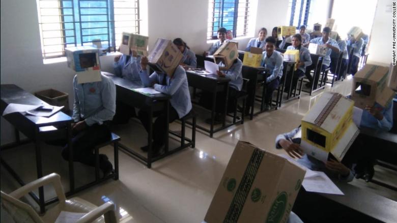 Indian College Makes Students Wear Cardboard Boxes To Preven