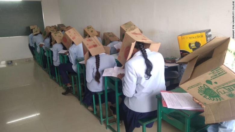 Indian College Makes Students Wear Cardboard Boxes To Preven