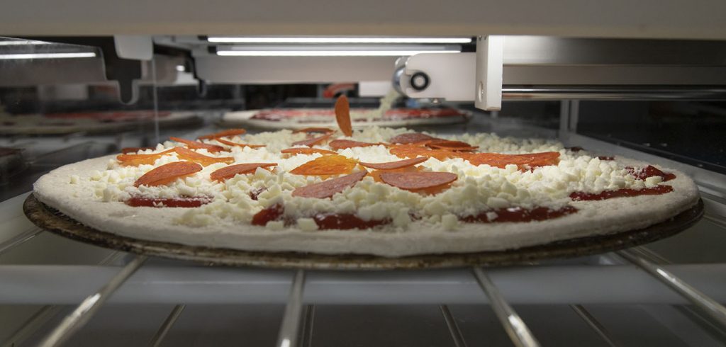 New Pizza Making Robot That Can Make 300 Pizzas An Hour Serv