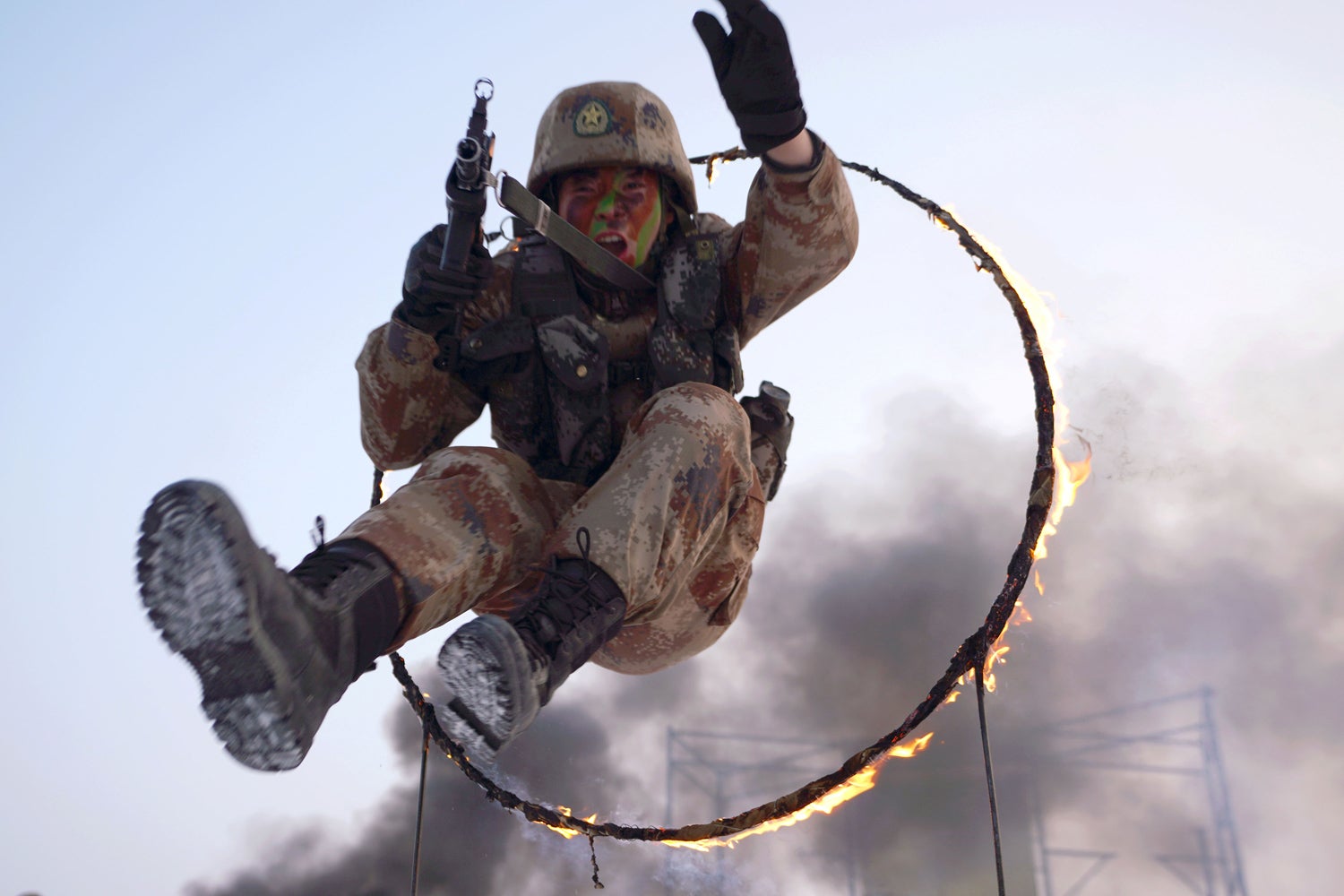 Watch Russian Troops Jump Through Large Flaming Hoops As Par