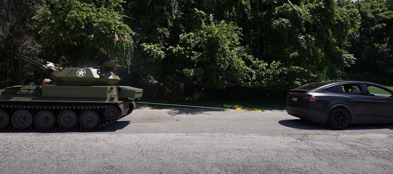 WATCH: Tesla Model X Goes Head-To-Head With An Armored Vehic