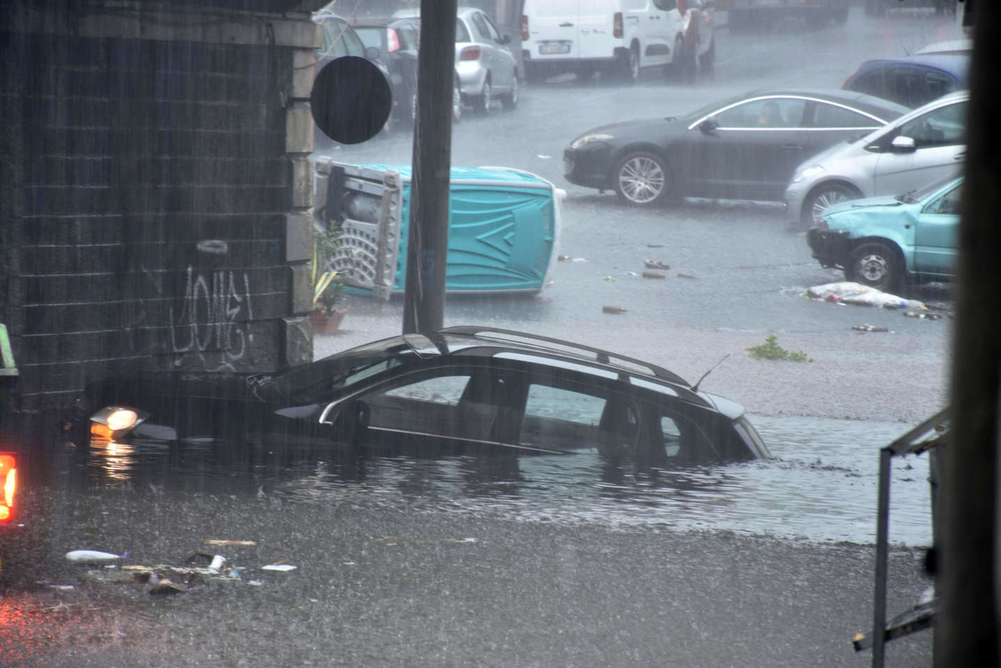 Watch Cars Floating Through Streets After A Rare And Deadly