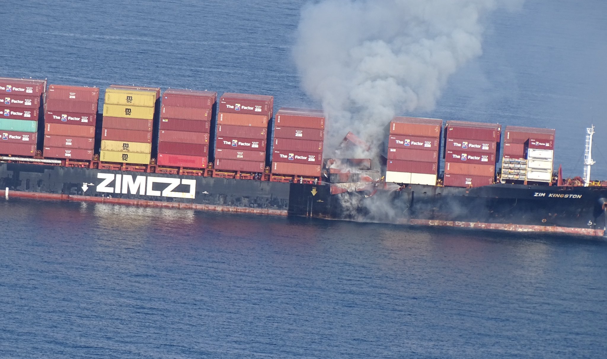 Several Shipping Containers Full Of Combustibles Fall Overbo