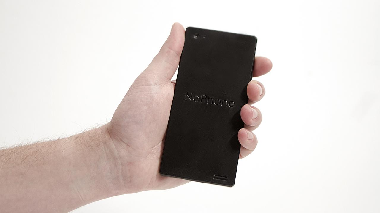 This Phone-Shaped Acrylic Slab Helps Get Rid Of Your Smartph