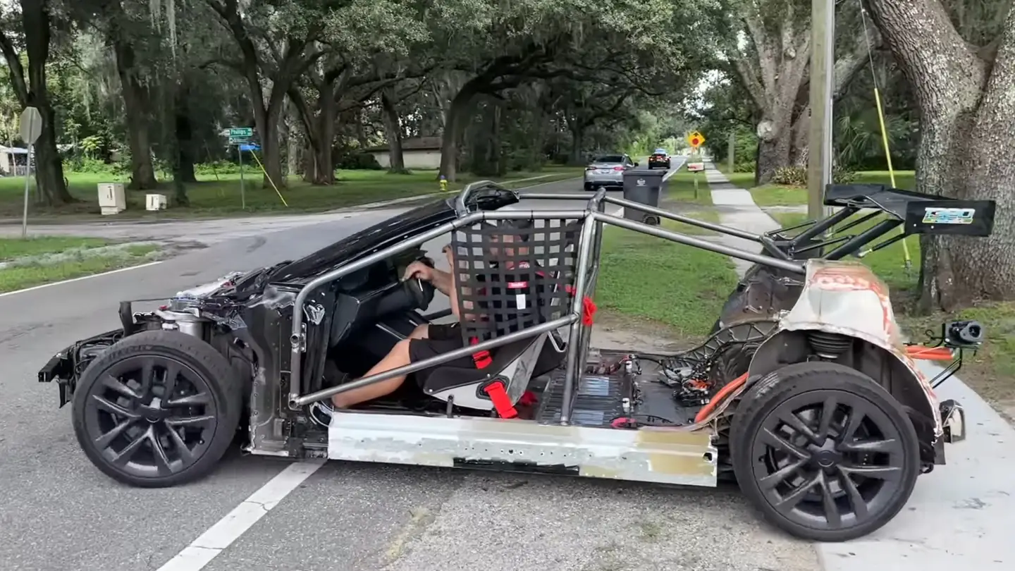 This YouTuber Cut Up A Tesla Model S To Build An Astonishing